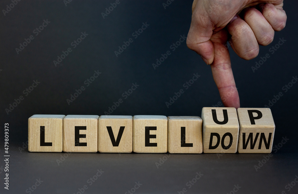 Level up or down symbol. Businessman turns cubes and changes concept ...