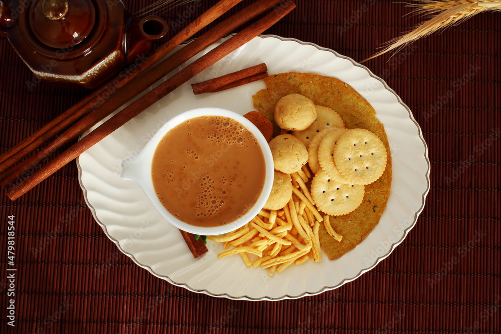 tea cup with traditional homemade indian gujarati tea time snack food ...