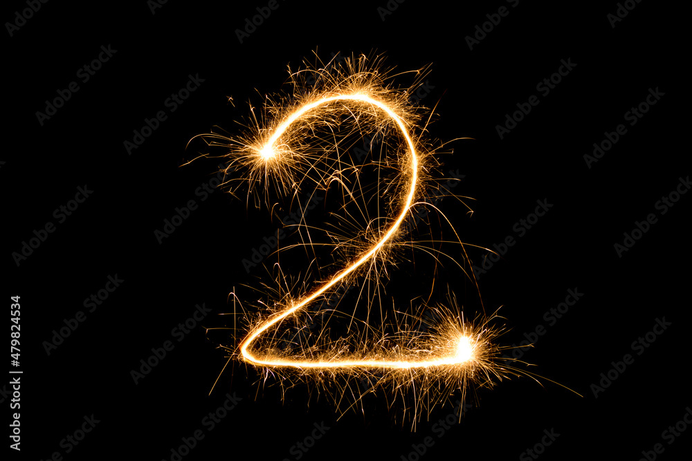 Sparkling number 2 two isolated on black background Stock Photo | Adobe ...