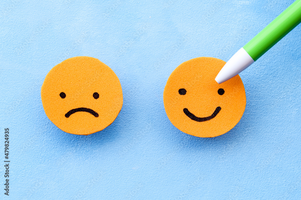 Rating of the service with emoticons on a blue background, the choice ...