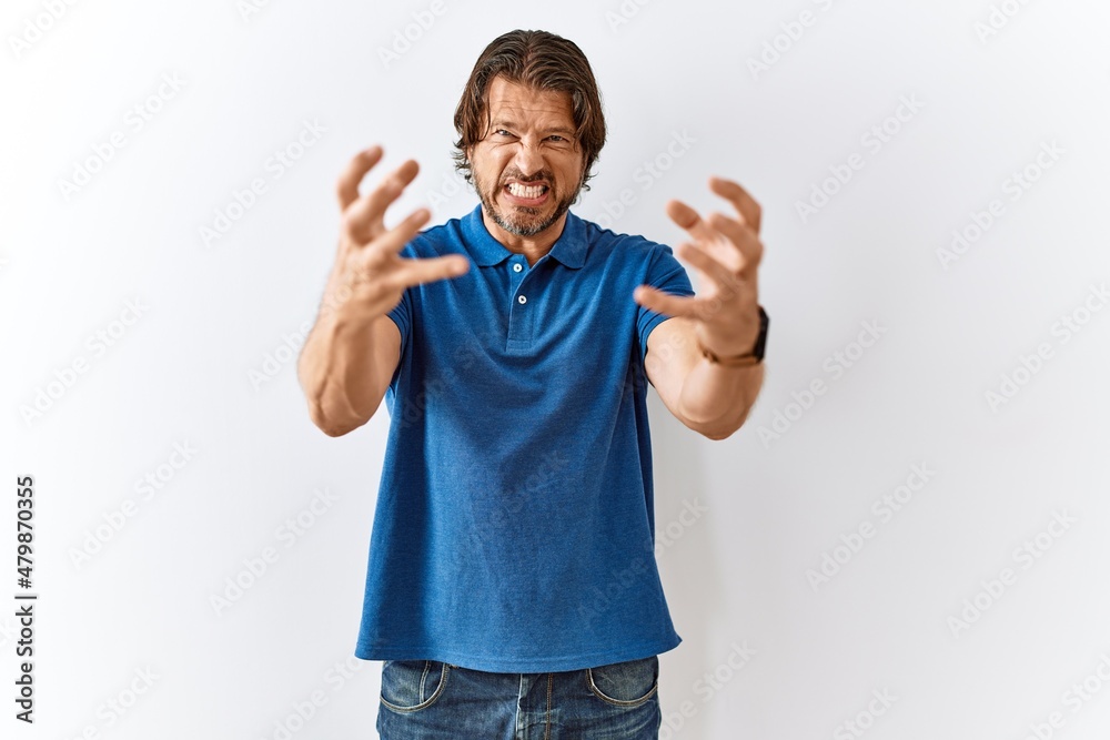 Handsome middle age man standing together over isolated background ...