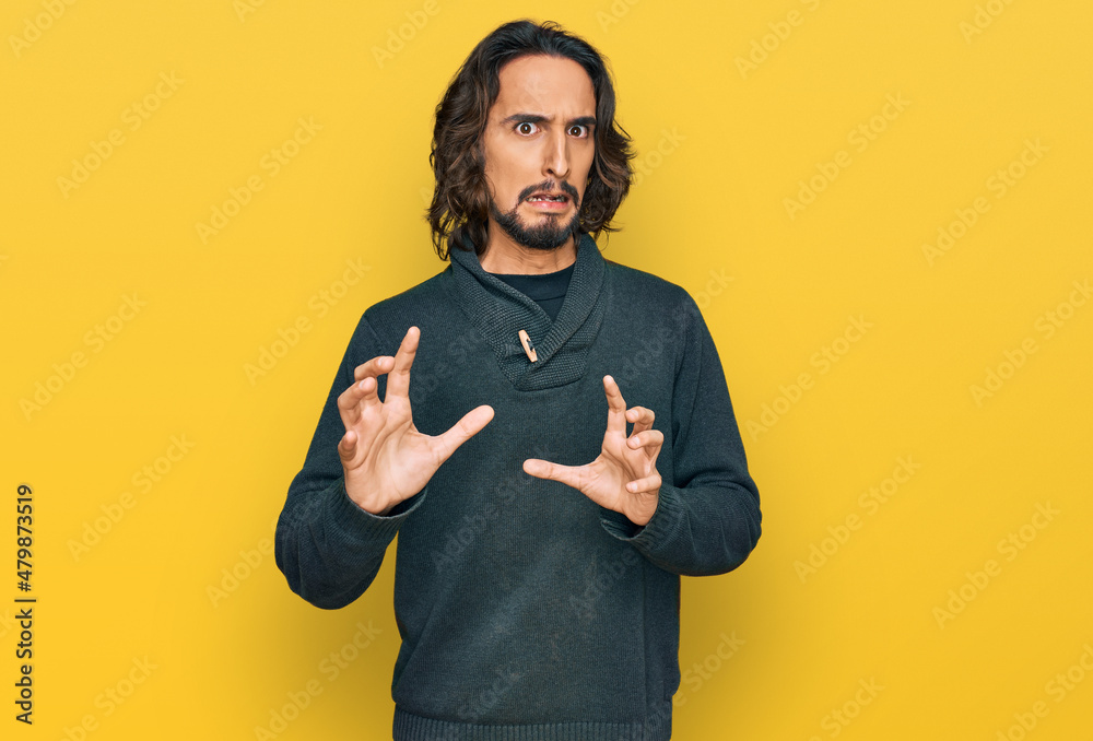 Young hispanic man wearing casual clothes disgusted expression ...