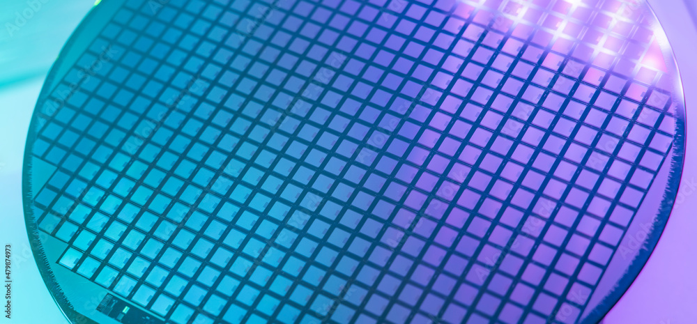 Silicon Wafer with microchips used in electronics for the fabrication ...