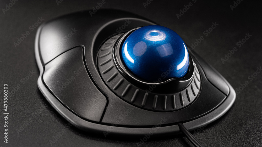 Trackball Computer Mouse on a black background. Control Device with ...