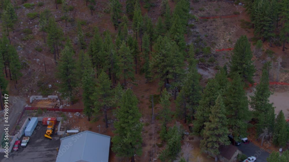 Flyover park ranger headquarters and parking lot and up mountainside ...
