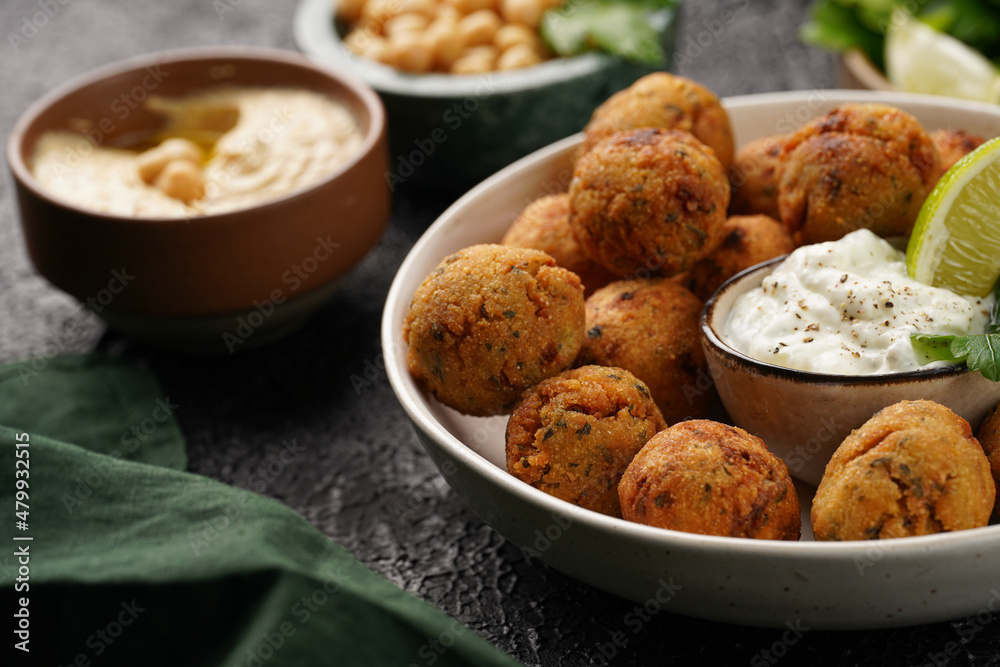 Traditional oriental chickpea deep fried falafel in a deep bowl with ...