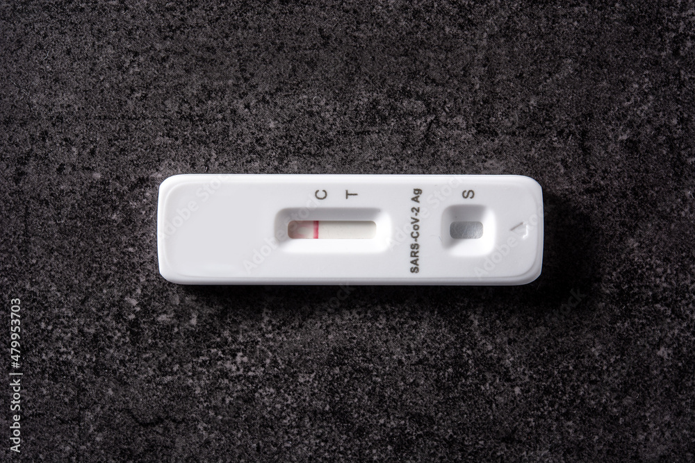 Covid-19 rapid antigen test on black background. Stock Photo | Adobe Stock