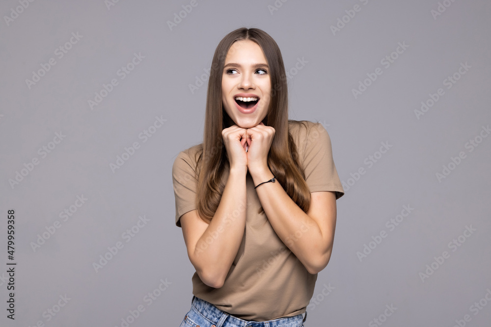 Human face expressions and emotions. Young adult woman holding arms on ...