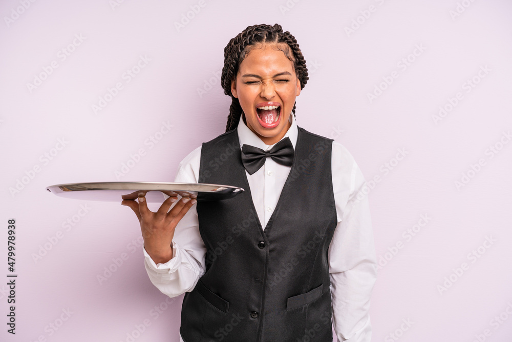 afro black woman shouting aggressively, looking very angry. waiter with ...