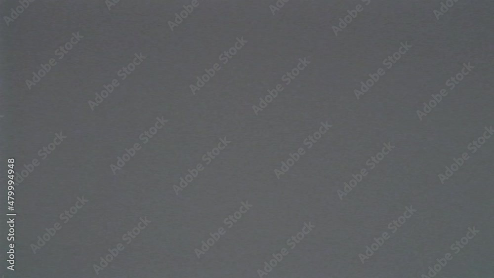 VHS flickering, defects, noise and artifacts on gray TV screen. Effect ...