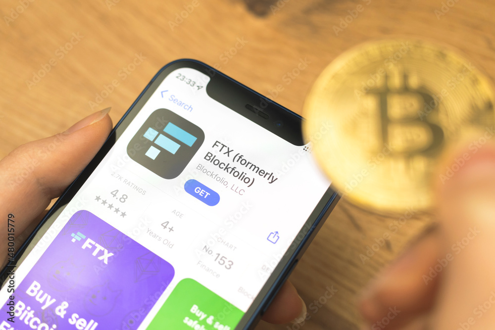 FTX Formerly Blockfolio app icon close-up. Woman with application on Apple iPhone 12 Stock Photo ...