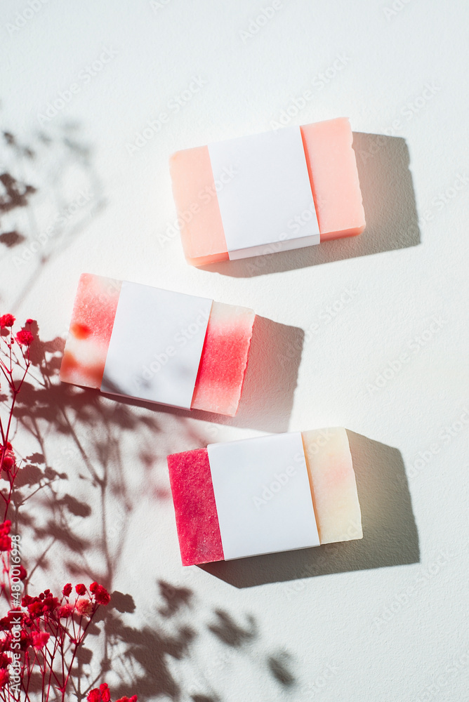 Three bars of homemade soap with labels on a white background. Mockup ...