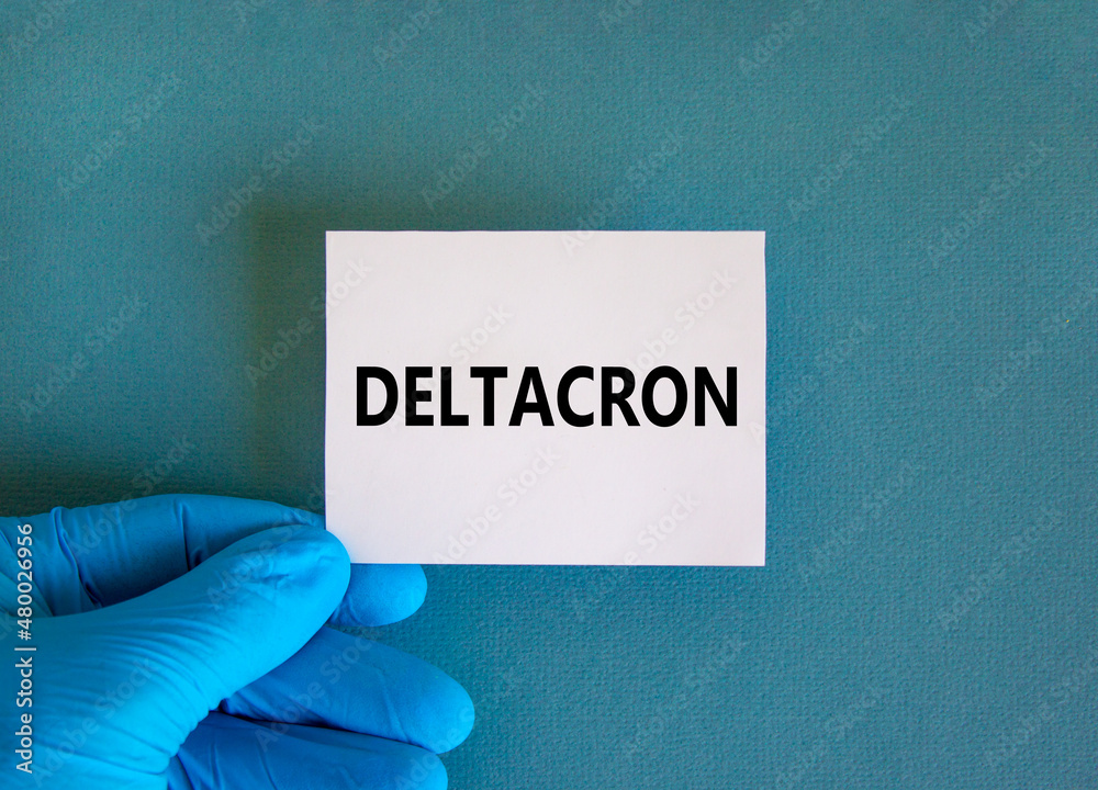 Covid-19 corona deltacron variant symbol. Hand in blue glove with white ...