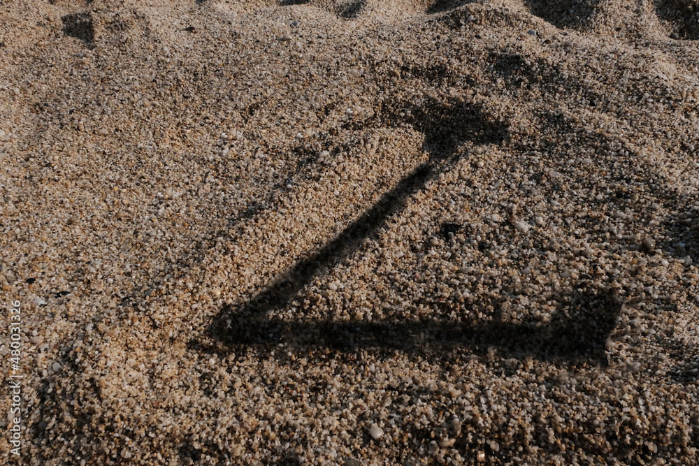 English alphabet. Sand on the beach. The letter L Stock Photo | Adobe Stock