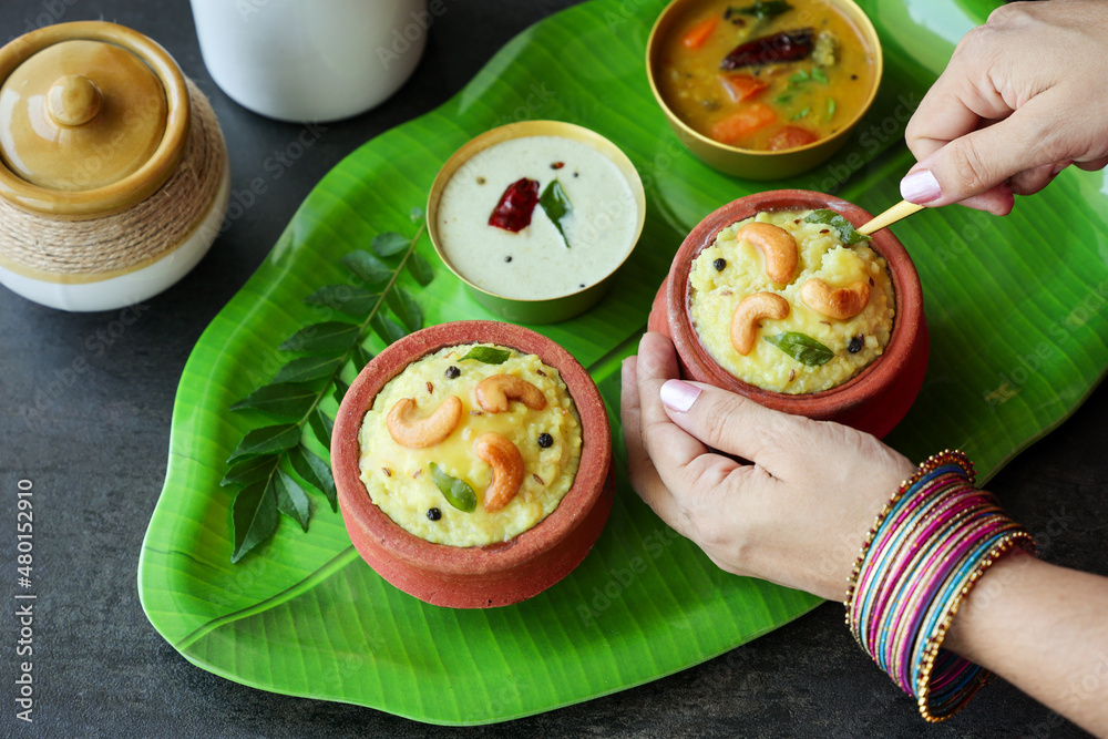 Ven Pongal Khara Pongal Sambar coconut chutney woman hand serving ...