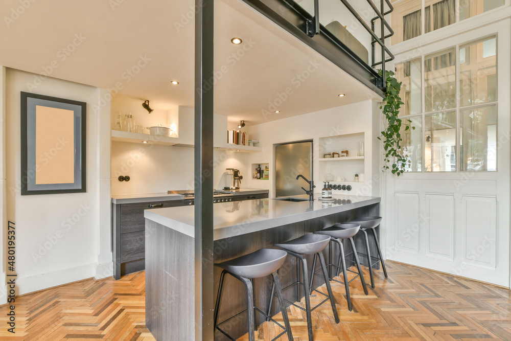 Modern kitchen interior with bar counter and chairs Stock Photo | Adobe ...