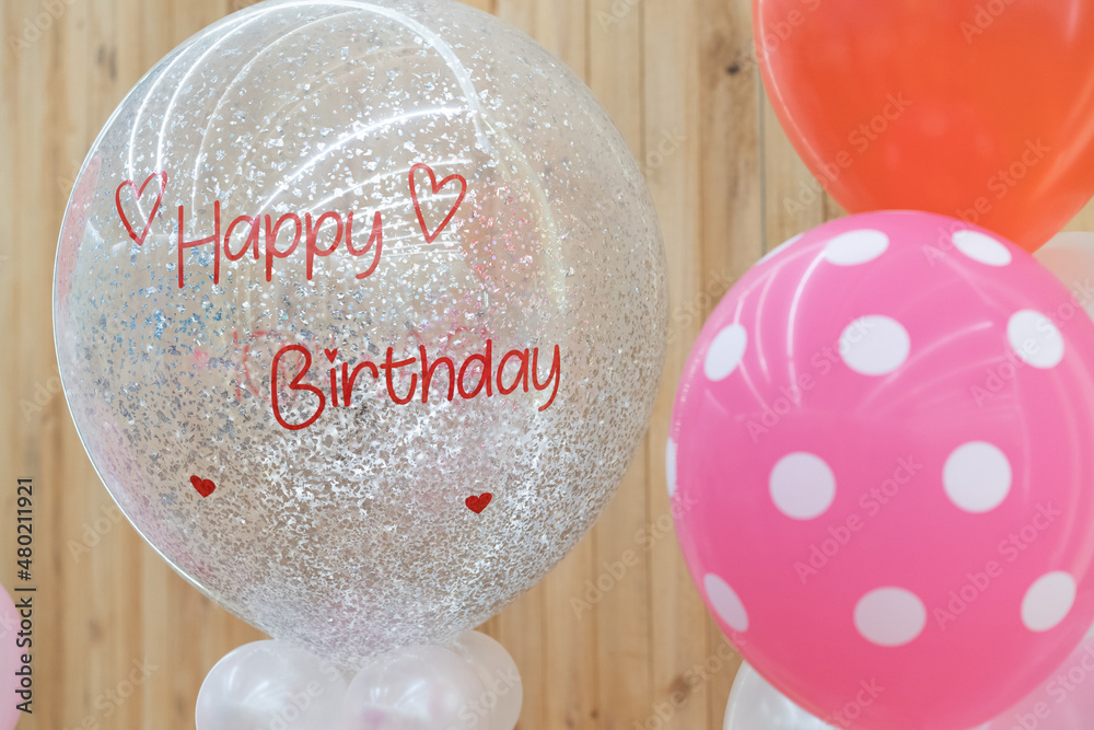 a happy birthday text on the balloon for gift in the birthday party ...