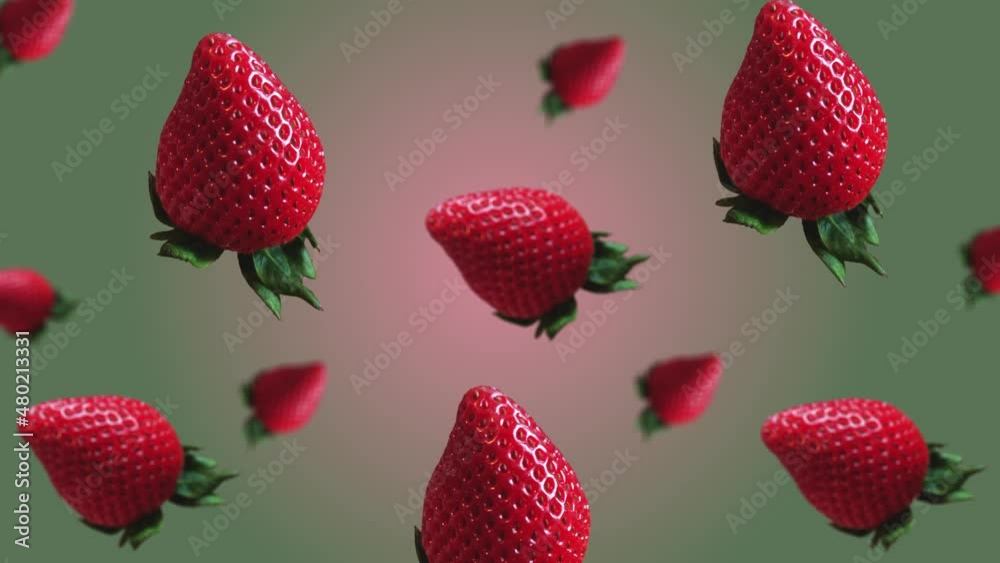 Flying and wiggle of different diameters whole of strawberries with ...