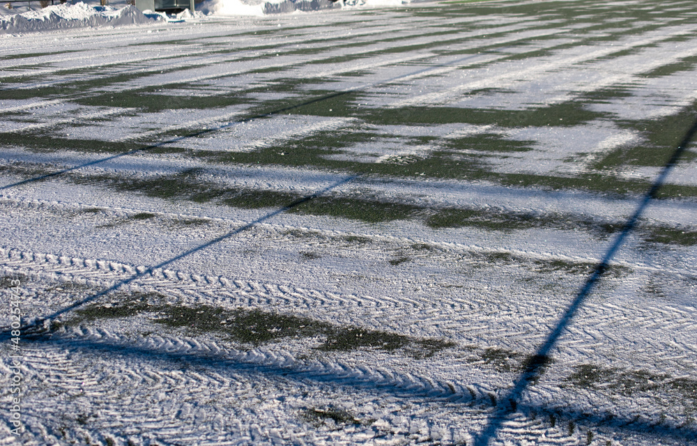 snow covered football field in winter with artificial grass Stock Photo ...
