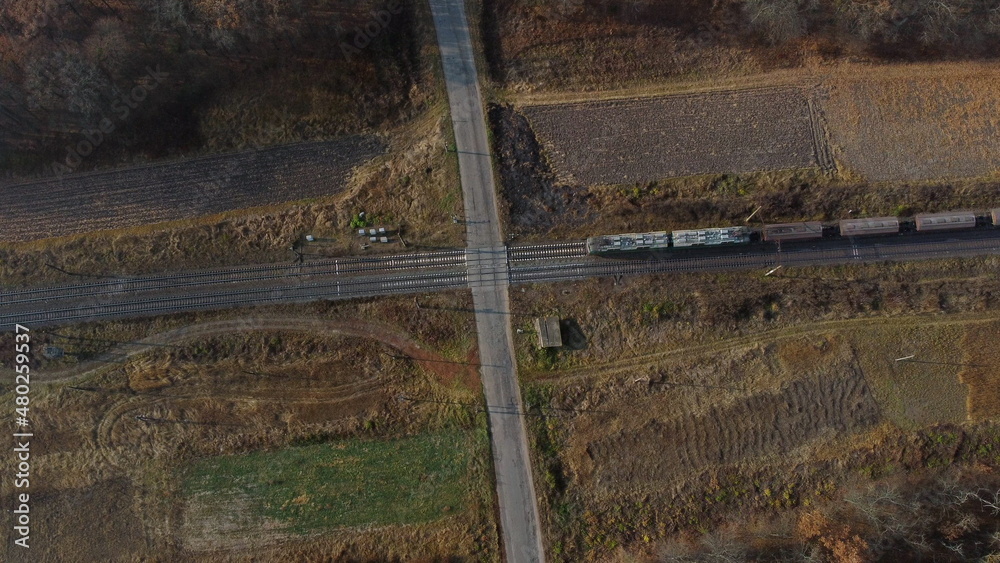 Top View Freight Train Passing Railway Crossing. Aerial Drone View ...