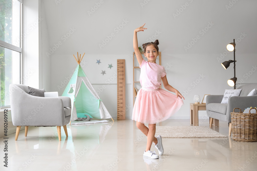 Adorable little ballerina dancing at home Stock Photo | Adobe Stock