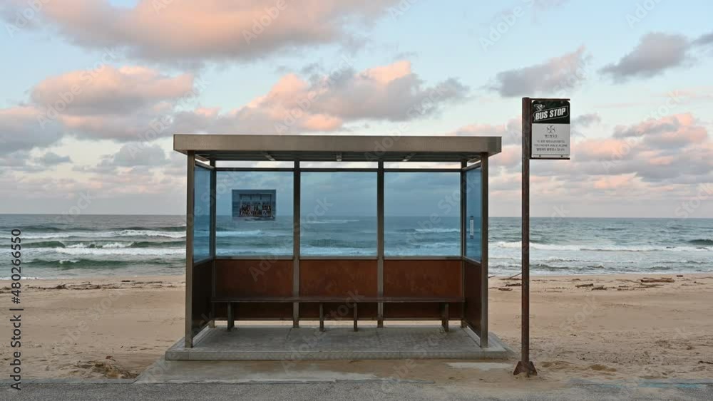 Bus stop on seaside beach with colorful sky at Jumunjin beach Stock ...