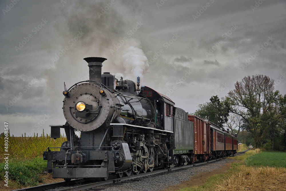 Foto de An Antique Restored Steam Freight Train Approaching Head on ...