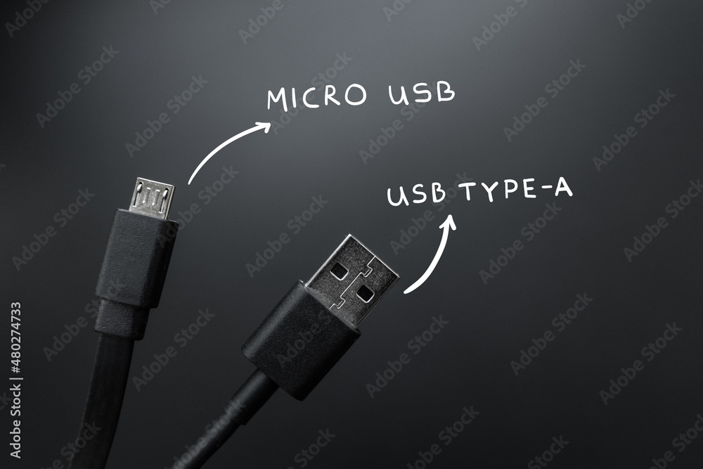 Connecting cables usb type a and micro wires. old technological ...