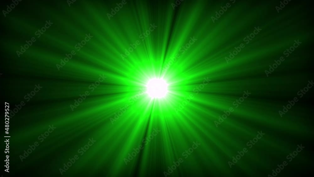 Bright light in the centre of frame with light rays glistening on the ...