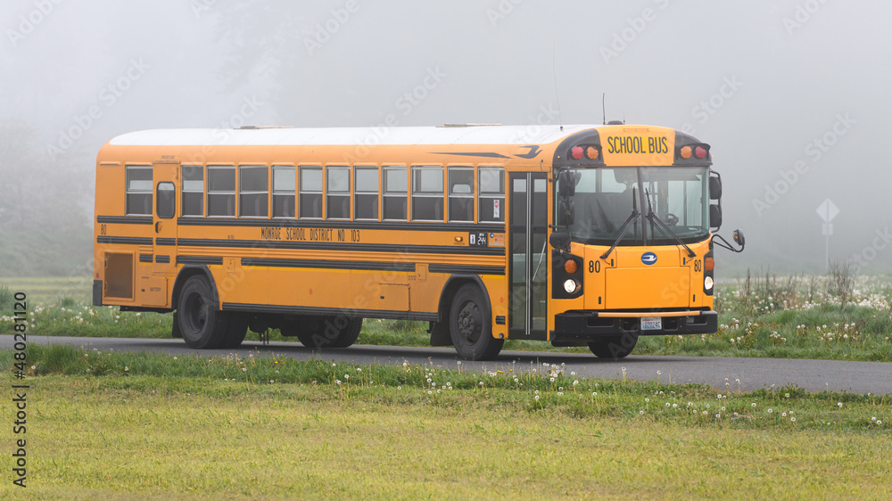 Monroe, WA, USA - April 29, 2021; A Monroe School Bus on a misty ...