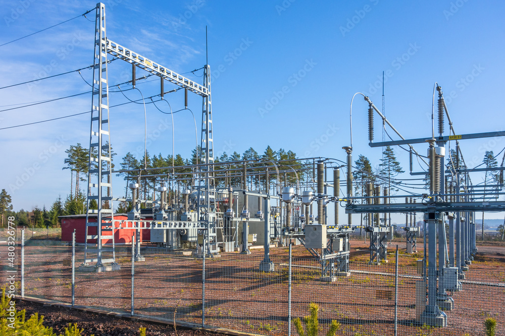 Electrical substation with a electric pylon Stock Photo | Adobe Stock