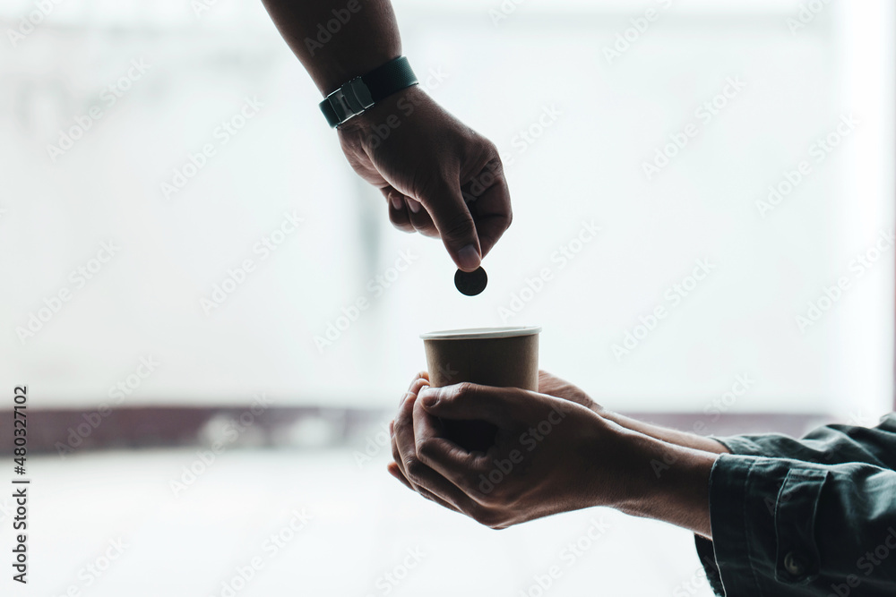 People Giving Money To The Poor