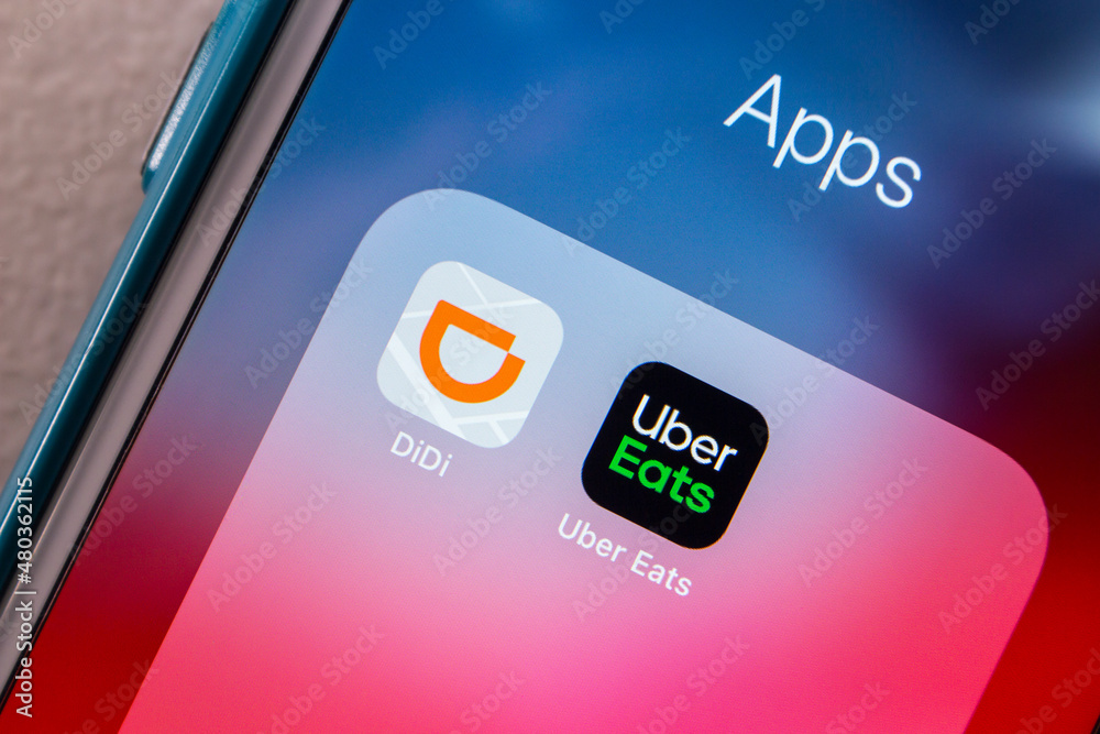 Kumamoto, JAPAN - Jul 7 2021 : Concept image of DiDi Rider and Uber ...