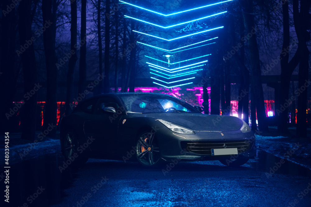 Ferrari GTC4Lusso at the empty city street, with led backlight Stock ...