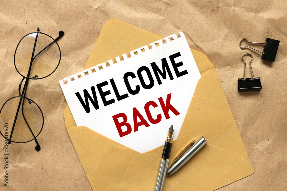 Welcome back. text on paper in an envelope Stock Photo | Adobe Stock