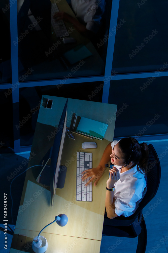 Foto de Top view shot of Asian professional female assistant service ...