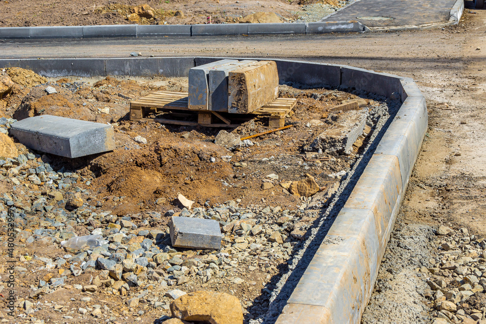 construction of secondary road junction, installation of curb stone ...
