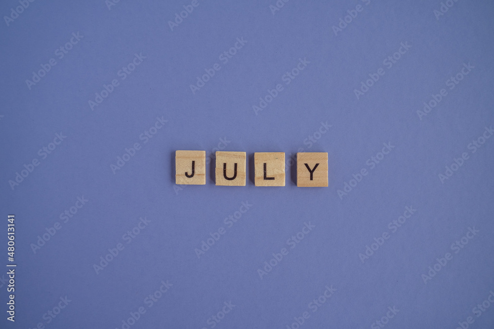 Foto de The seventh month of the year July - from isolated letters on ...