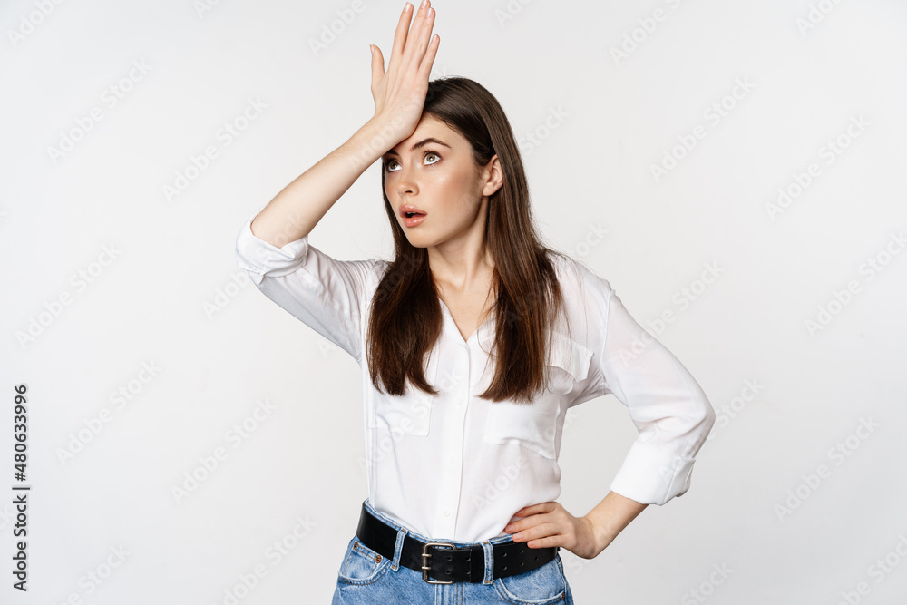 Annoyed young woman facepalm, slap forehead and roll eyes bothered ...