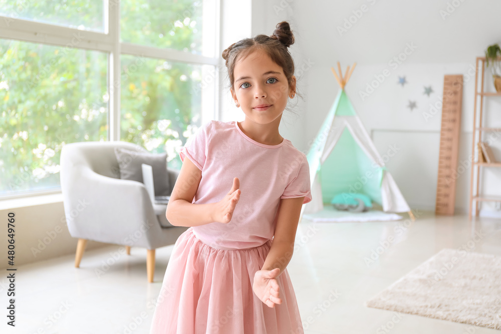 Adorable little ballerina dancing at home Stock Photo | Adobe Stock