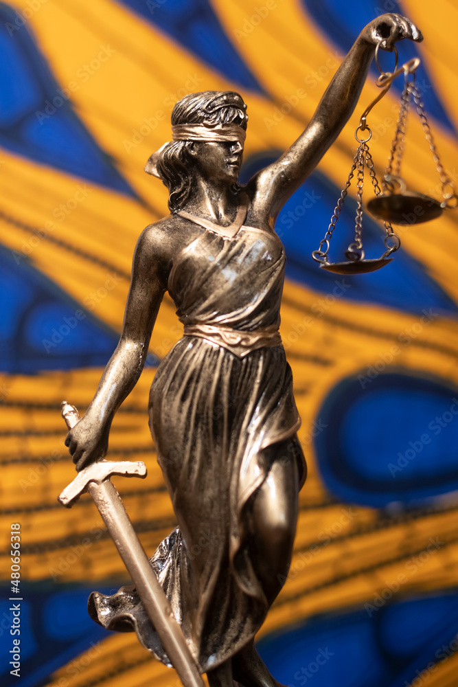 Bronze Lady Justice With African Symbolism Stock Photo | Adobe Stock