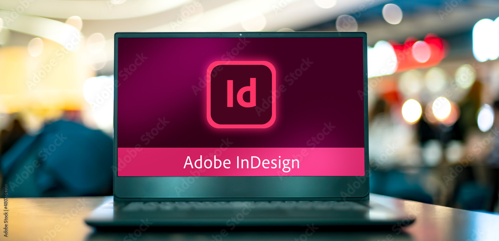 Laptop computer displaying logo of Adobe InDesign Stock Photo | Adobe Stock
