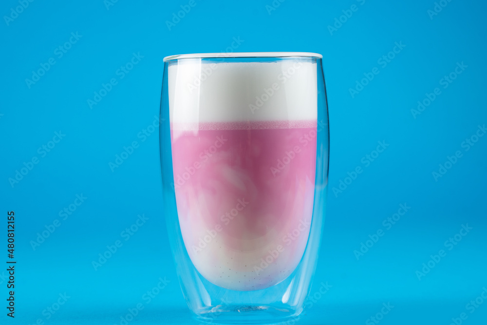 Pitahaya pink matcha on blue background. Matcha from dragon fruit ...