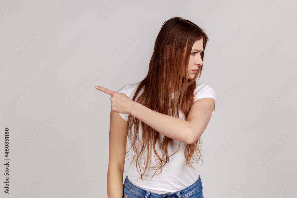Portrait of resentful upset attractive woman turning away with disgust ...