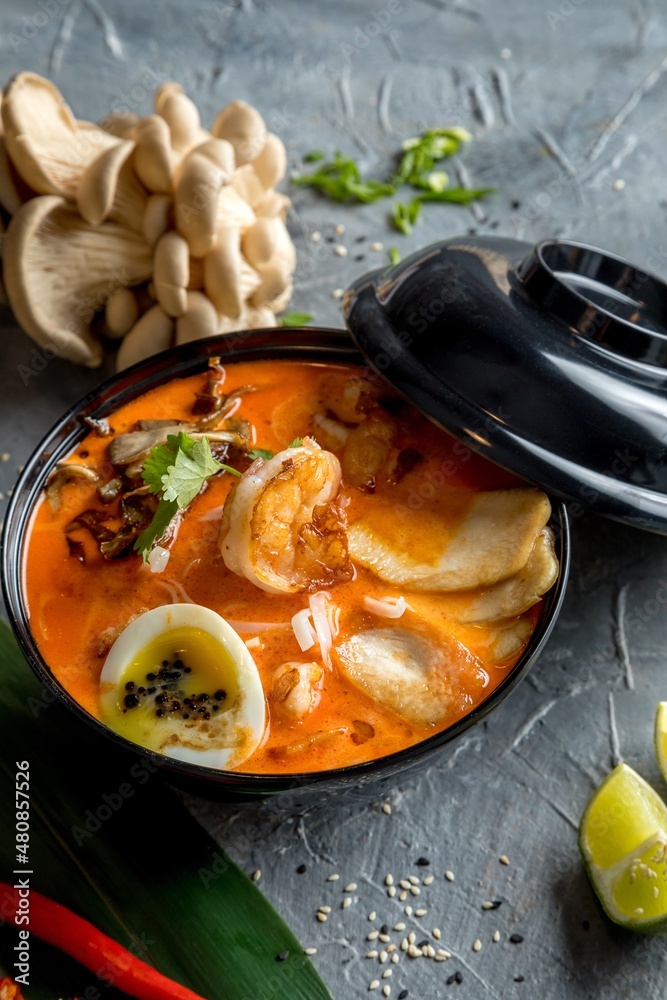 singapore laksa. spicy coconut milk-based noodle soup Stock Photo ...
