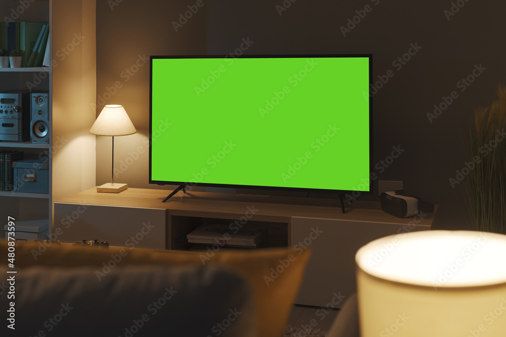 Television with horizontal green screen in the living room Stock Photo ...