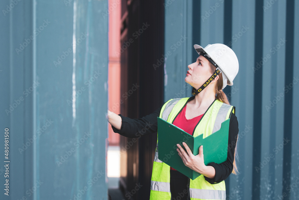 Businesswomen import export manager shipment large cargo sea ...