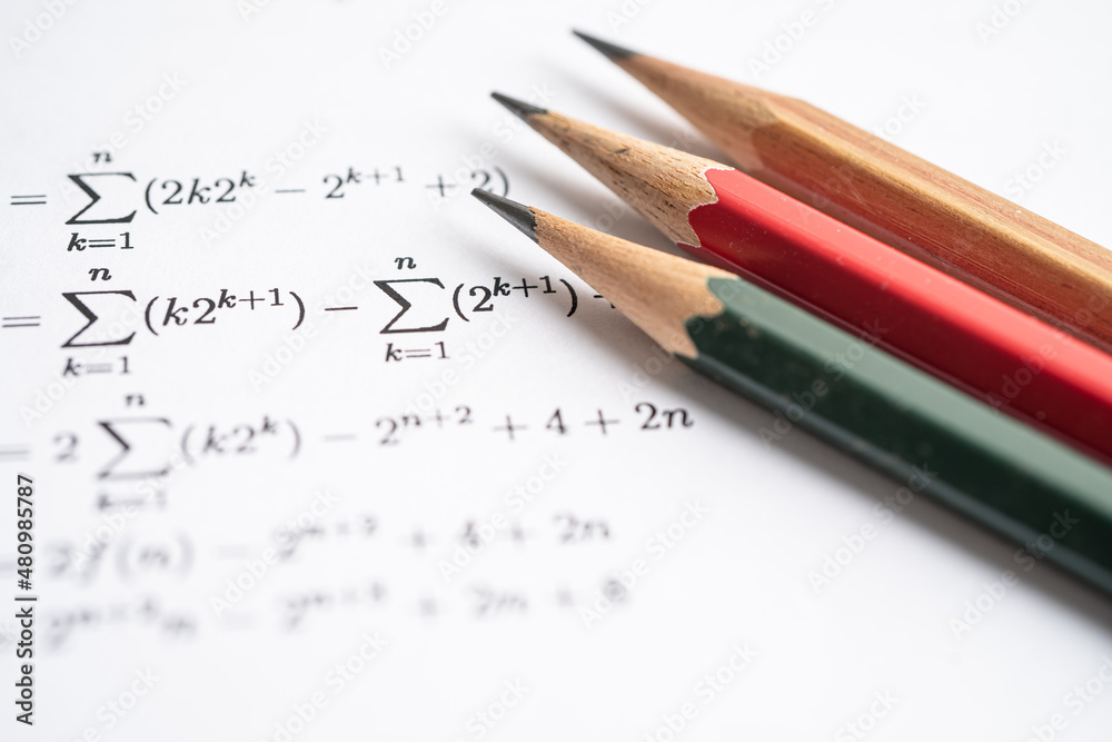 Pencil on mathematic formula exercise test paper in education school ...