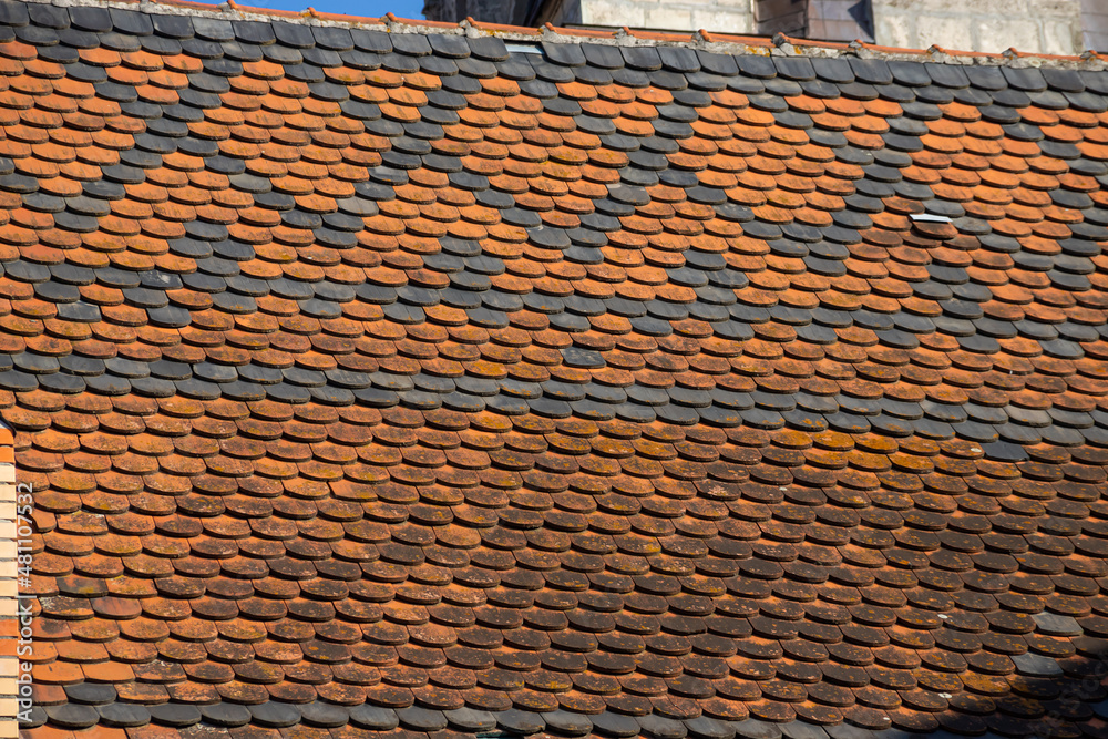 Seamless roof texture of flat red shingles with embedded line patterns ...