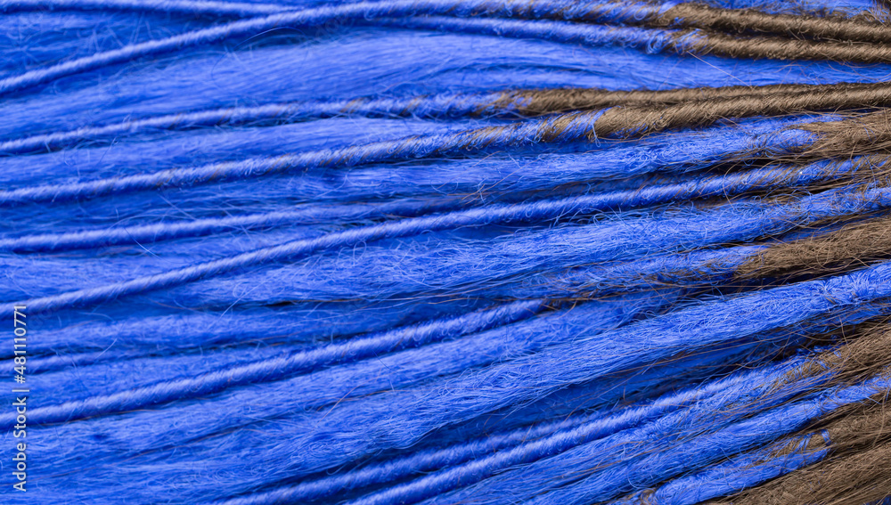 Dreadlocks close-up. Braided by a master hairdresser in the salon, hair ...